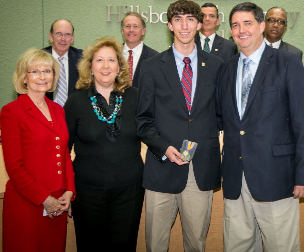 Sandy presented Derek Frantz of Jesuit High School with the Volunteer ...